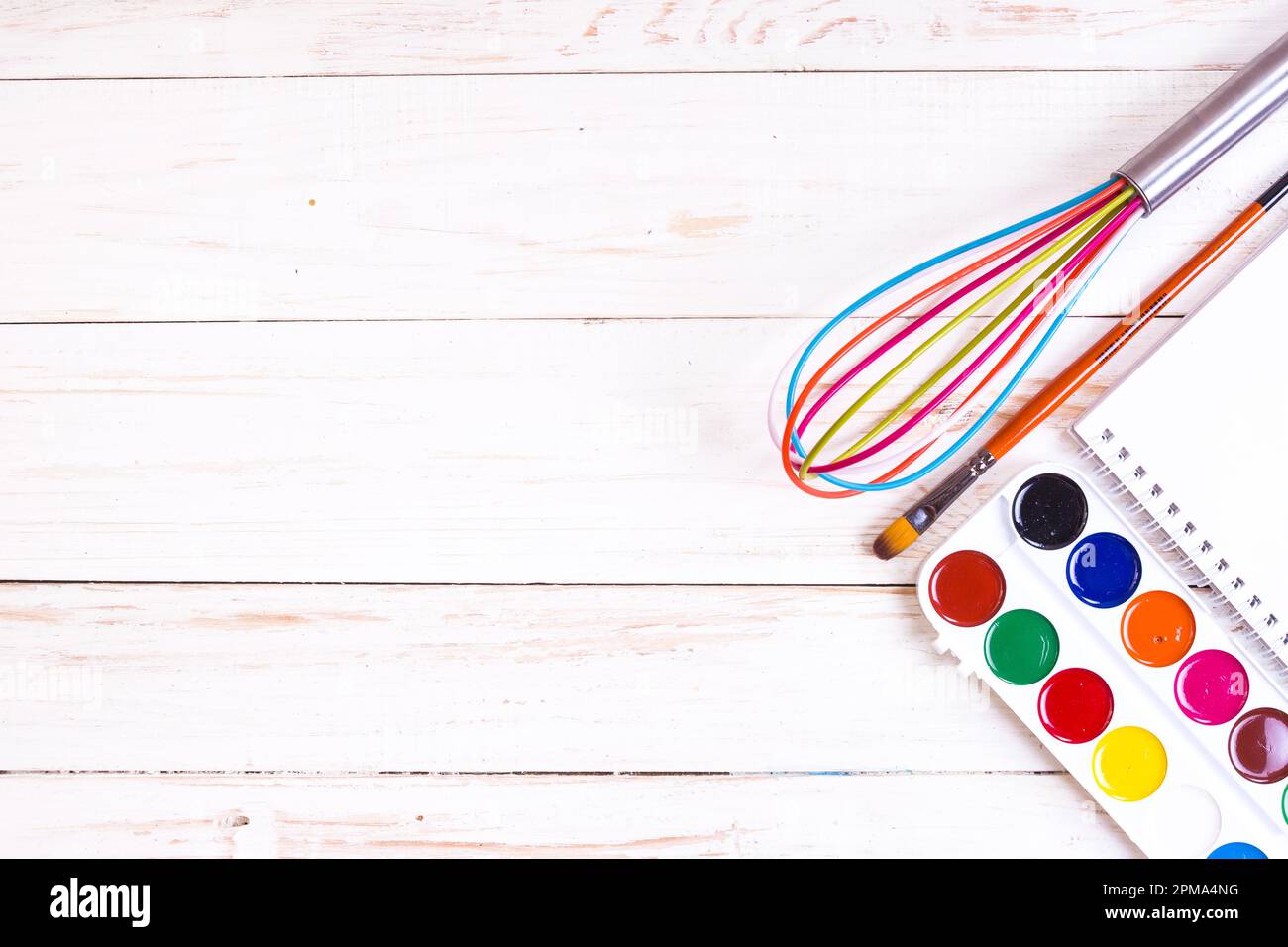 Sketch pad with paints, brush, whisk and tablet. Concept of creativity ...