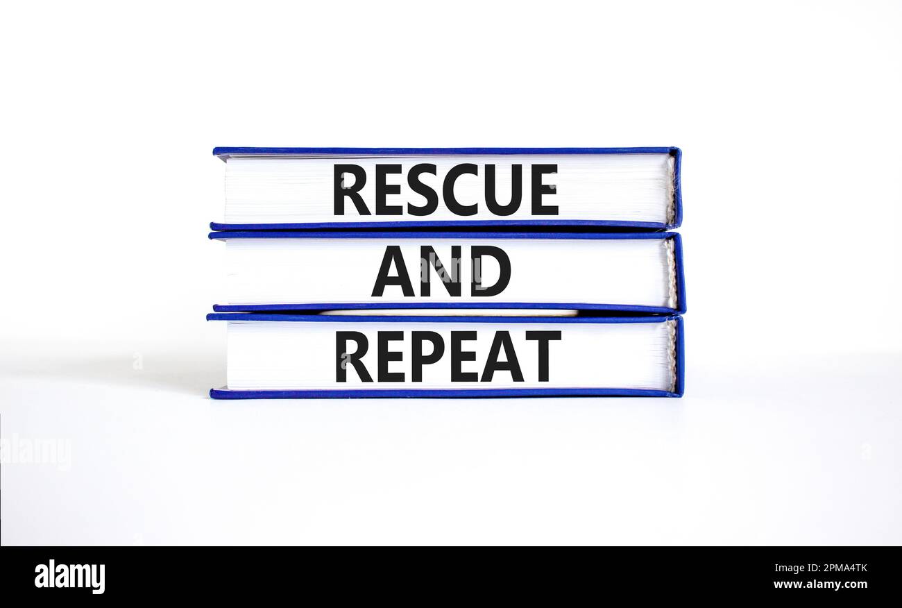 Rescue and repeat symbol. Concept words Rescue and repeat on books on a ...