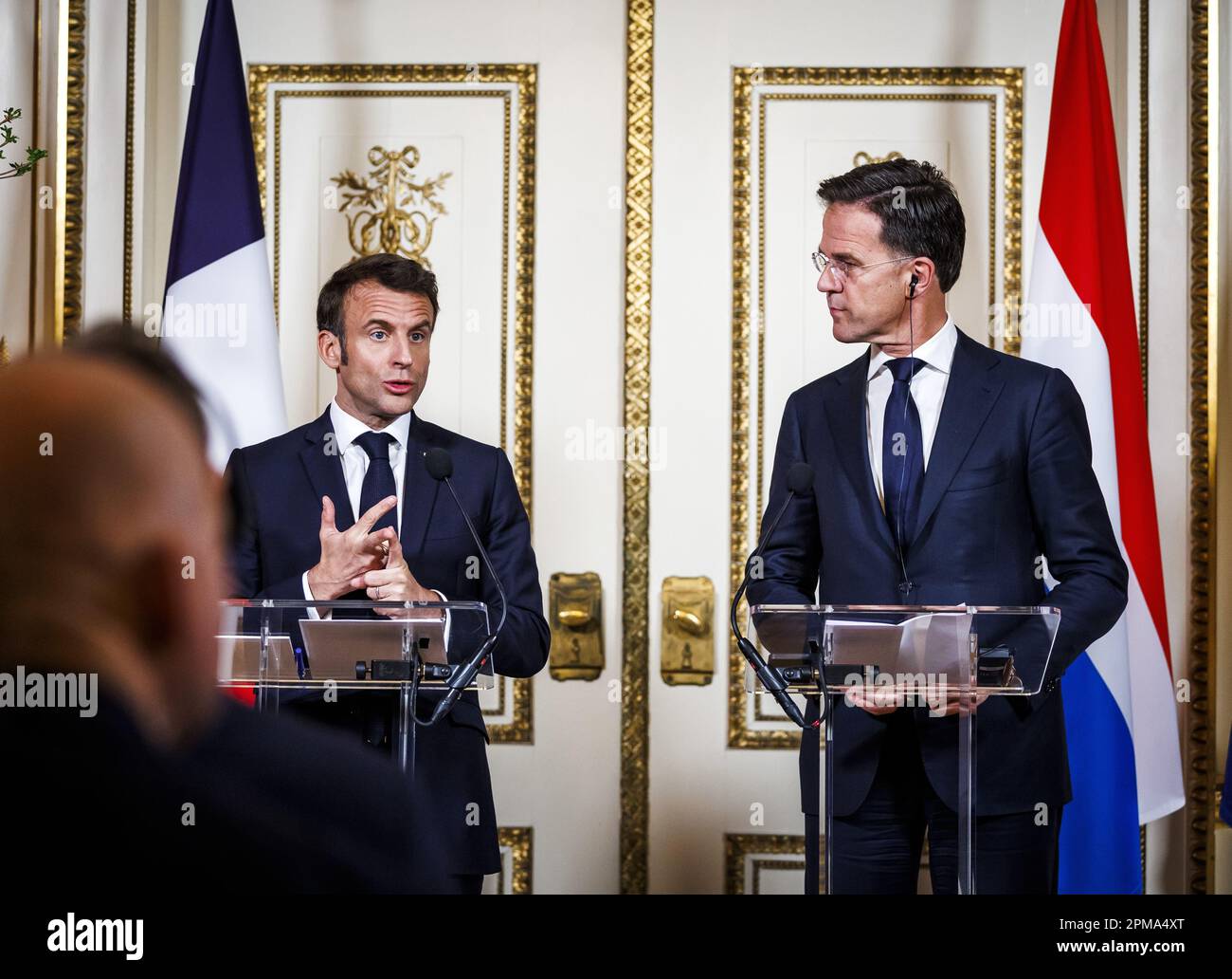 AMSTERDAM - 12/04/2023, French President Emmanuel Macron and Prime ...