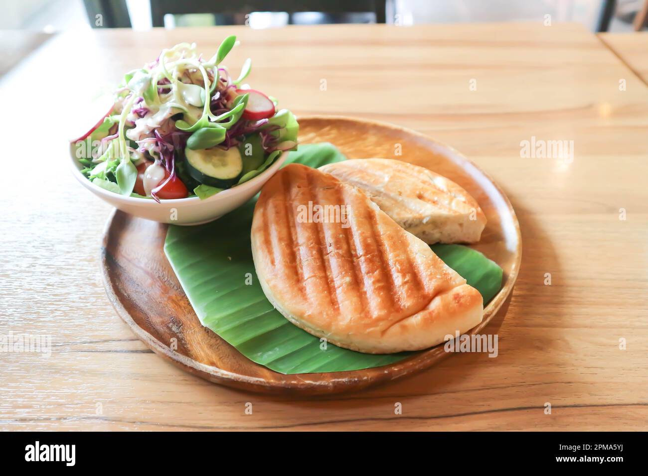 panini, italian sandwich and salad or ham and cheese sandwich for serve ...