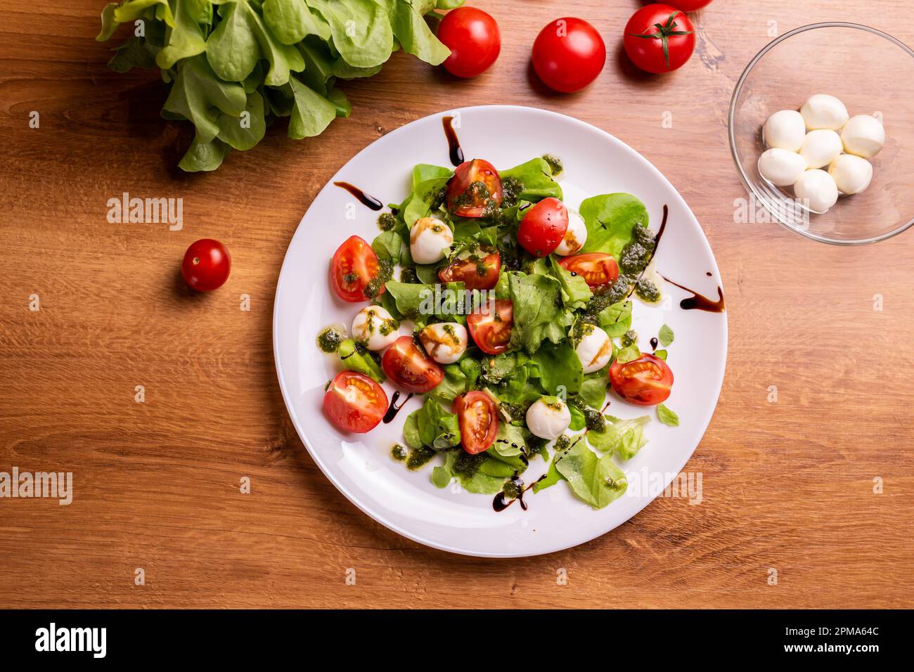 Plate of healthy classic top view caprese salad with mozzarella cheese ...