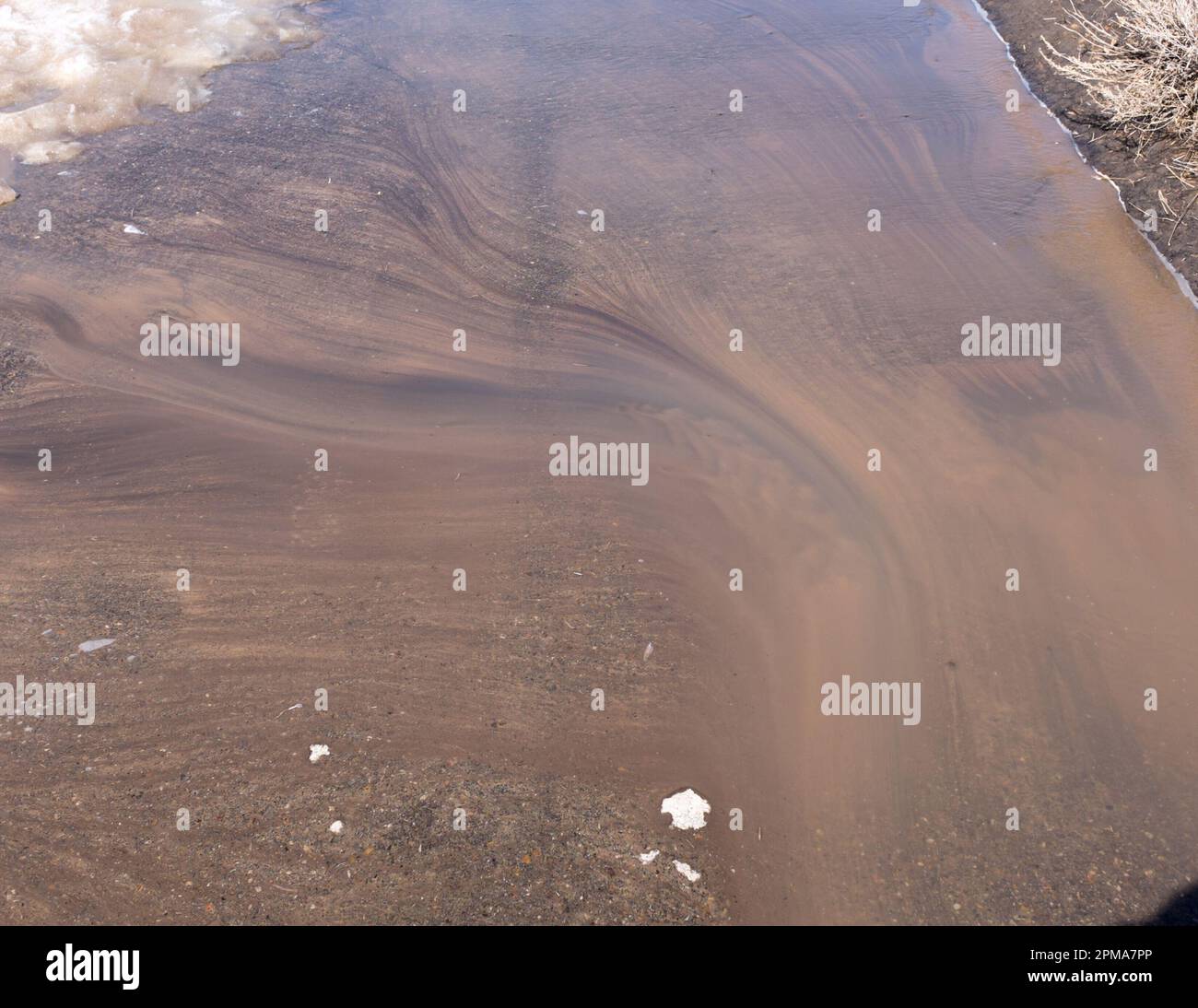 Spring melting creates interesting mud flows as gravity pulls the water ...