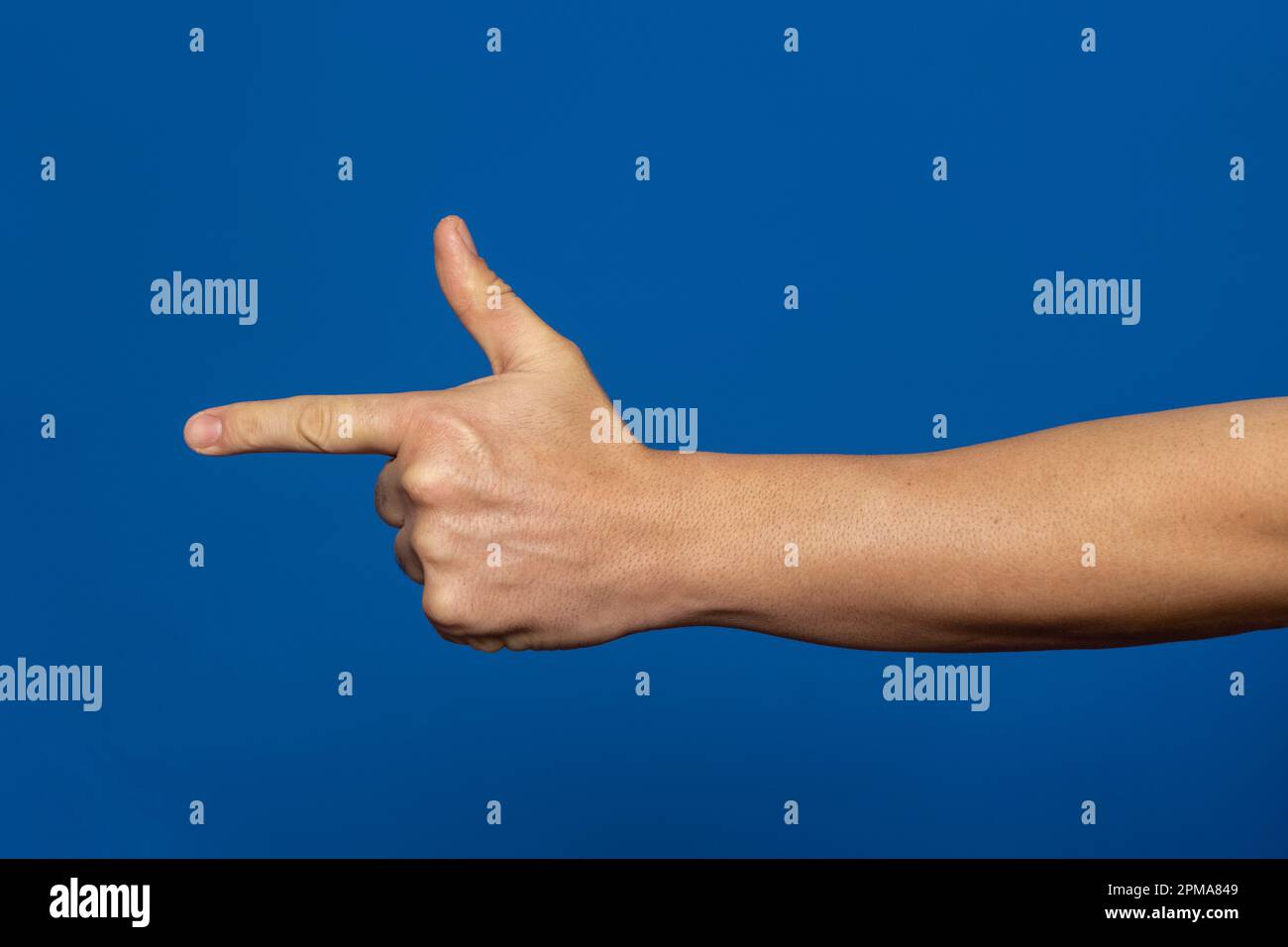 Hand pointing gun hi-res stock photography and images - Alamy