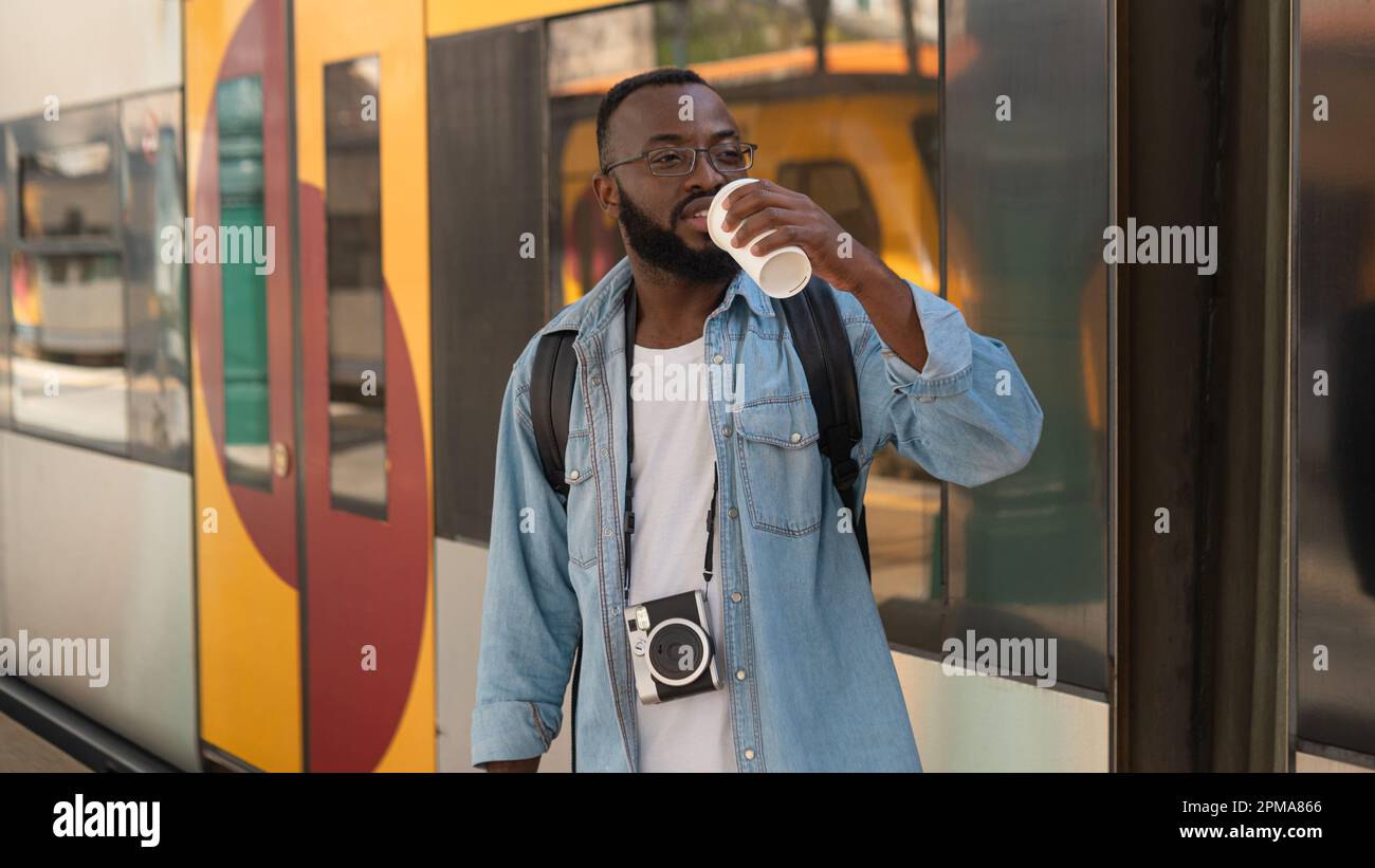 Standing looking at camera railway station platform transportation hi ...