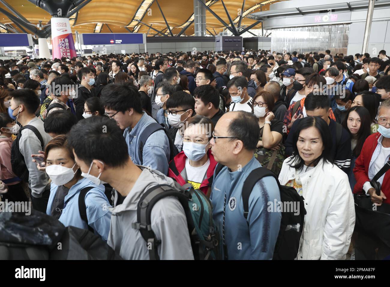 People queue up for Hong Kong-Zhuhai-Macao Bridge Shuttle Bus at Hong ...