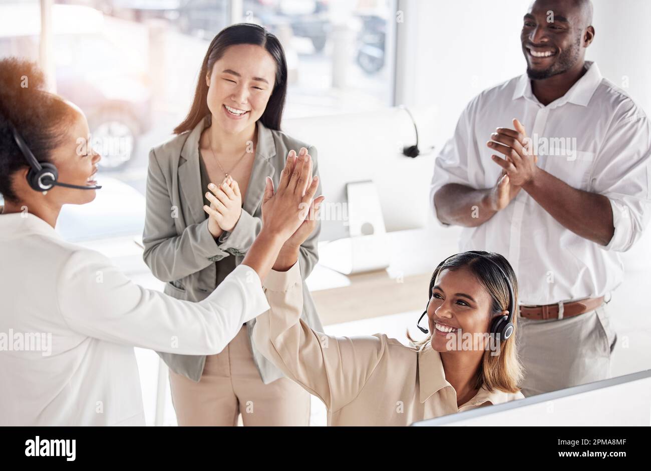 Call center, happy business people and high five of team, success and ...