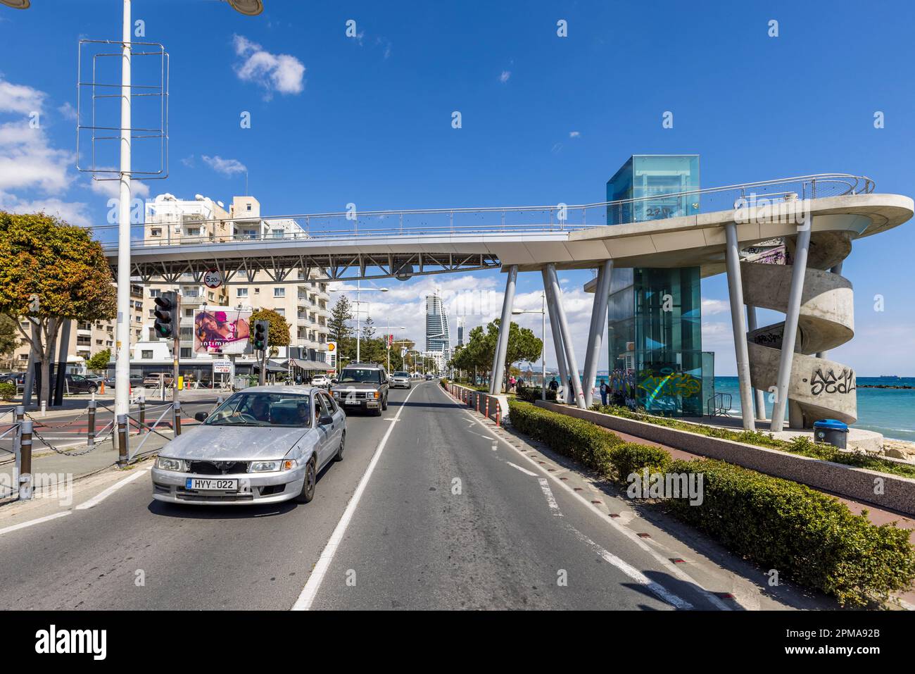 Pedestrian overpass on the four-lane road separating the city of ...