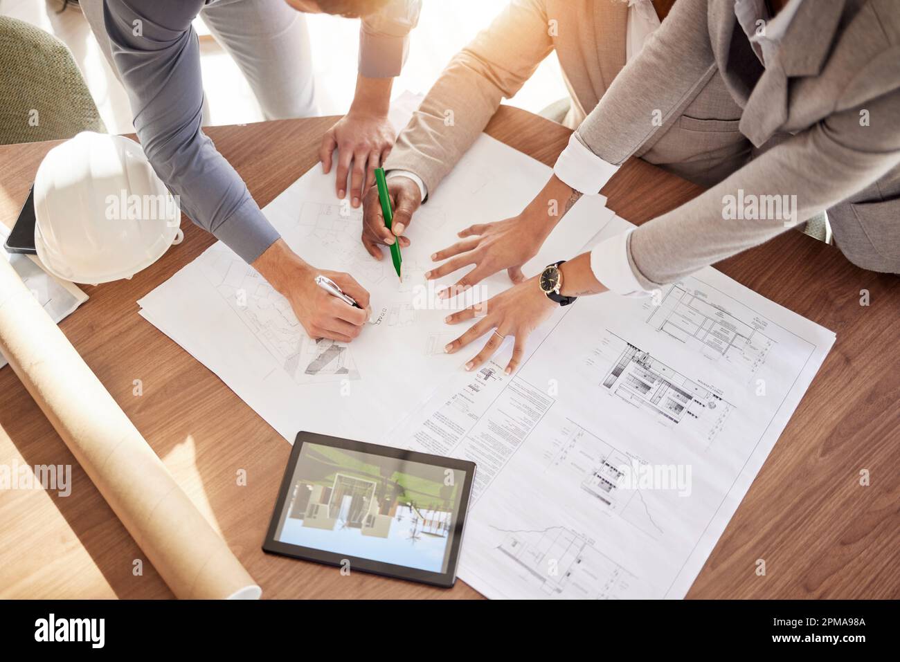 Top view, engineer and hands with blueprint, tablet and planning for ...