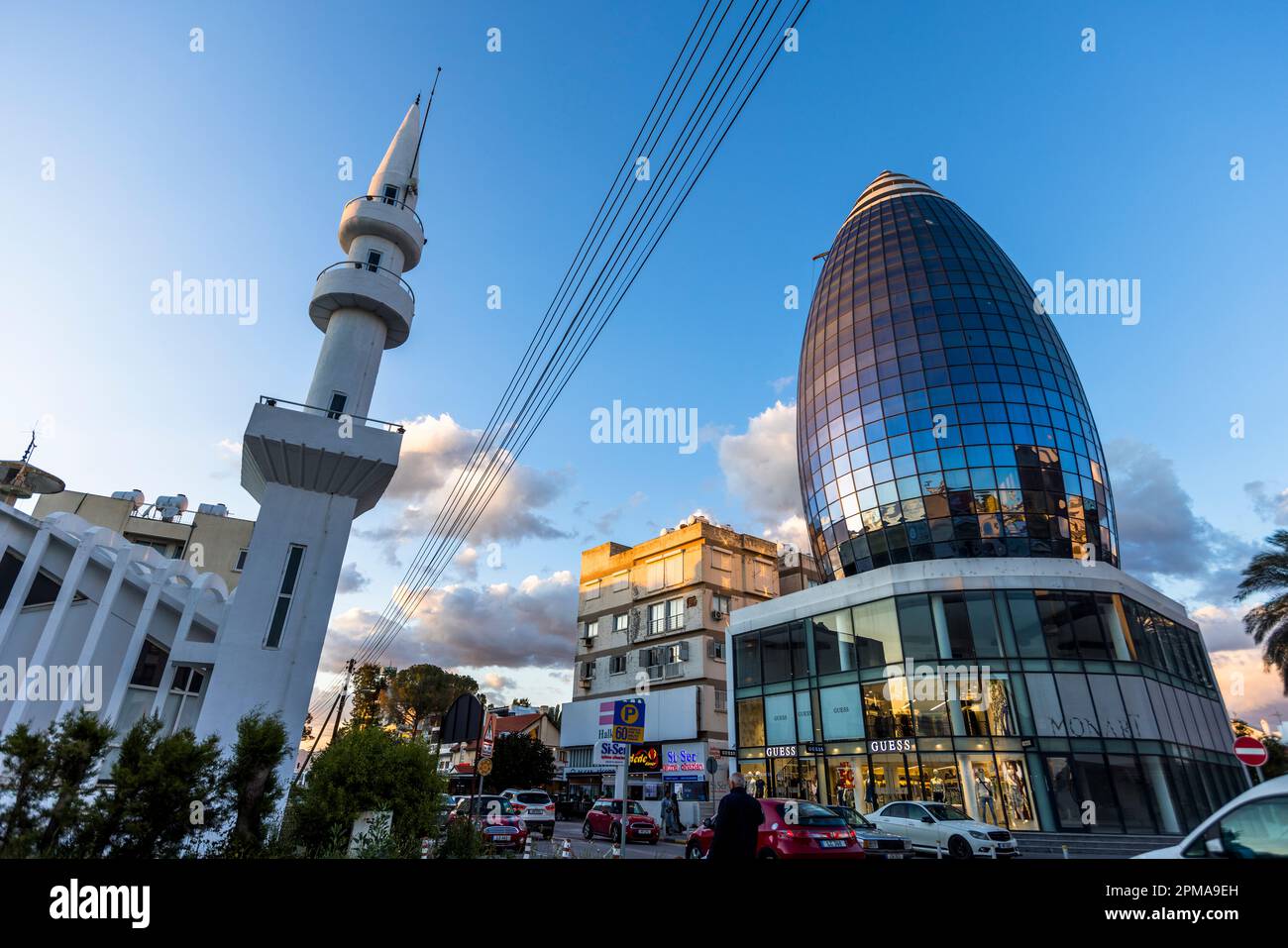 Mosque and modern building in North Nicosia, Cyprus Stock Photo - Alamy