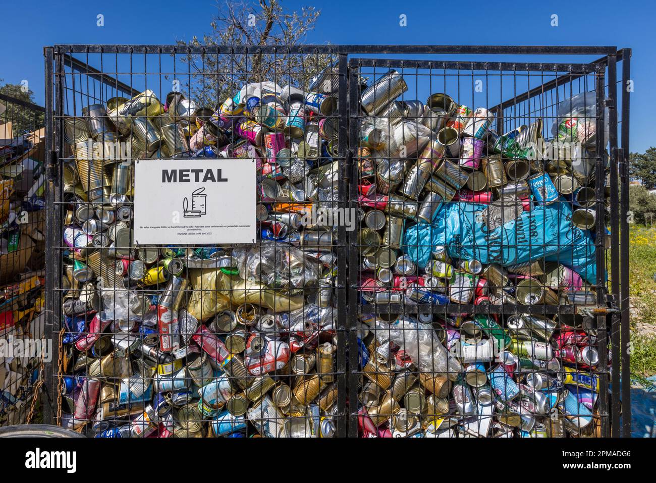 Recycling collection point in Panagra, Cyprus Stock Photo - Alamy