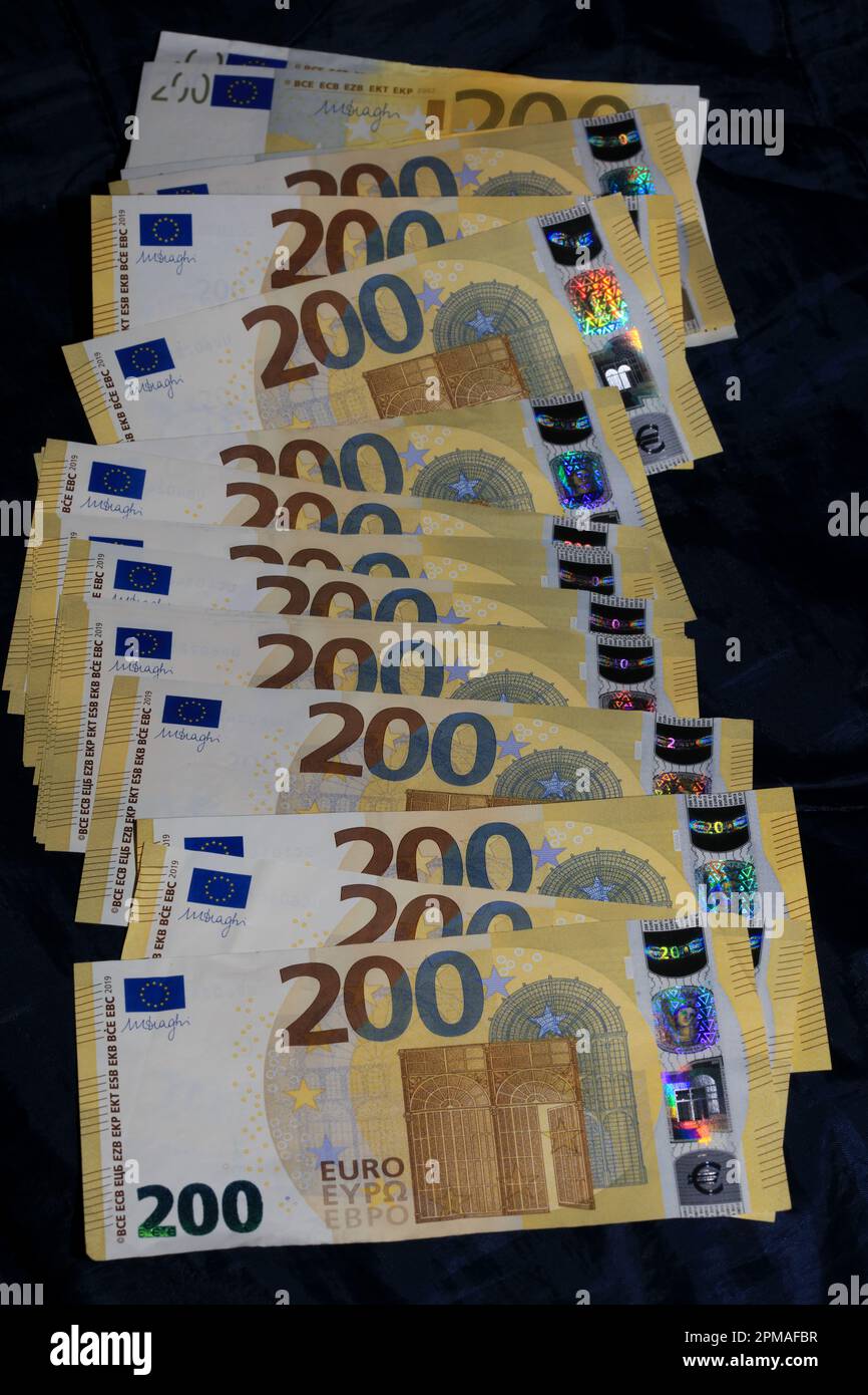 200 euro banknotes european bill cash money isolated on black ...