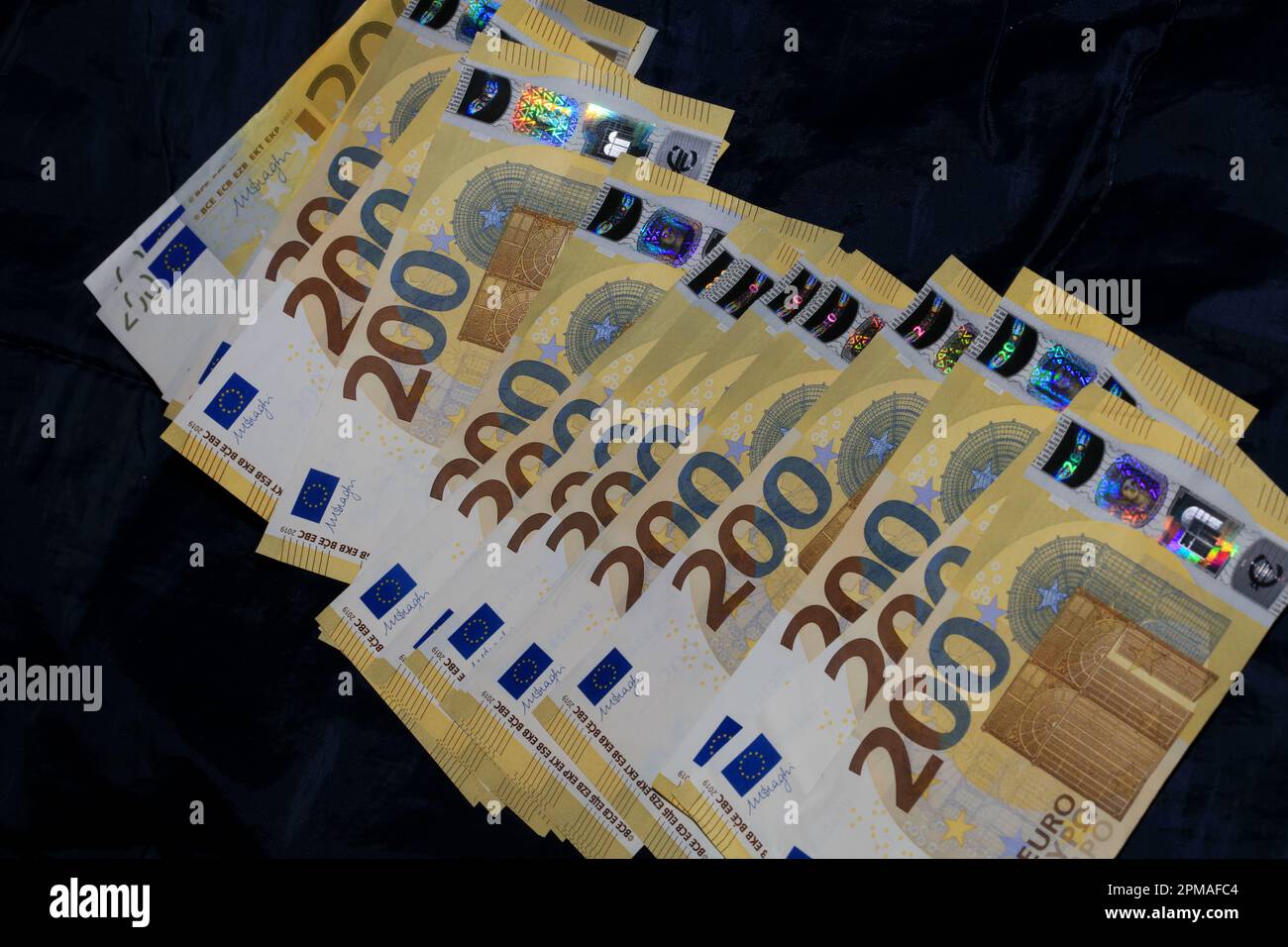 200 euro banknotes european bill cash money isolated on black ...