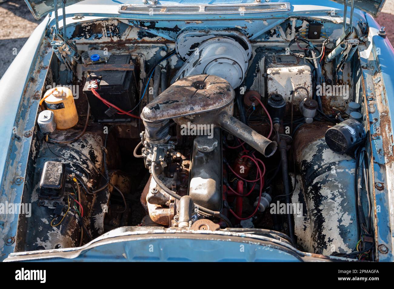 engine of an old Volvo P1800 of blue color, it is rusty Stock Photo - Alamy