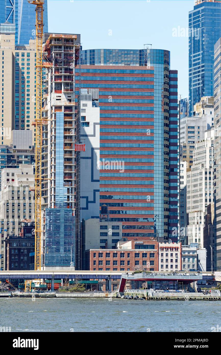 The red-and-blue AIG Building towers over NYC’s South Street Seaport ...