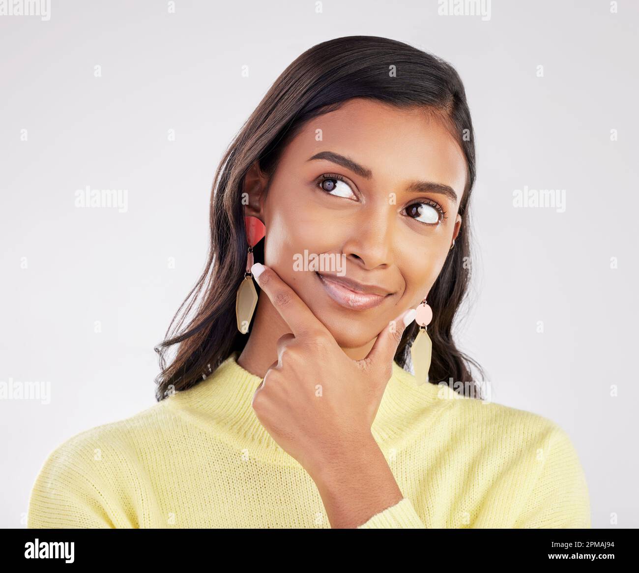 Face, thinking and mind with a woman on a white background in studio to ...