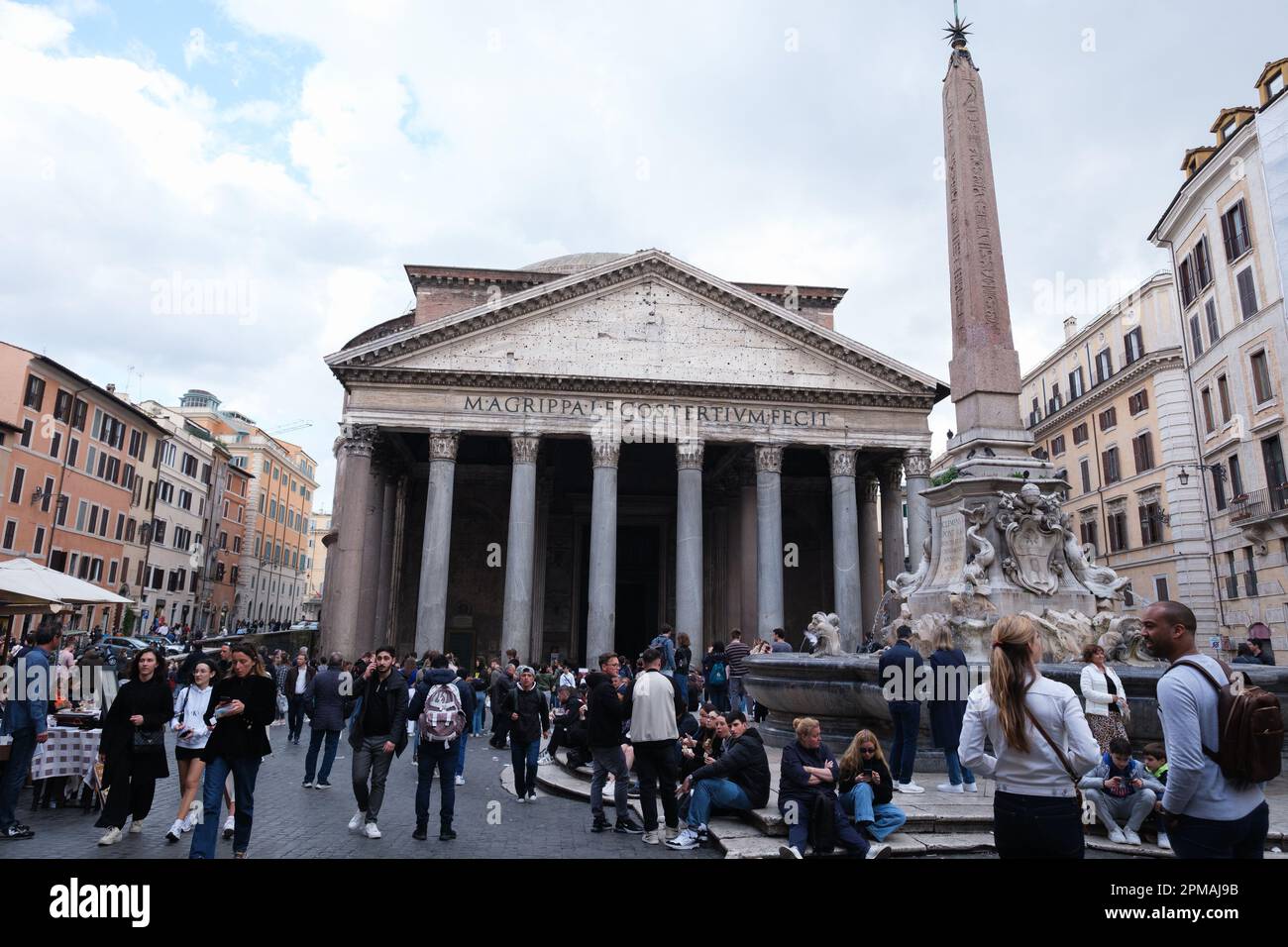 People are seen outside Agrippa's Pantheon or Pantheon of Rome, an ...