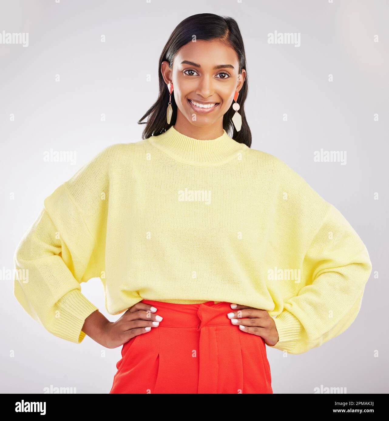 Happy woman, portrait smile and confidence standing isolated with hands ...