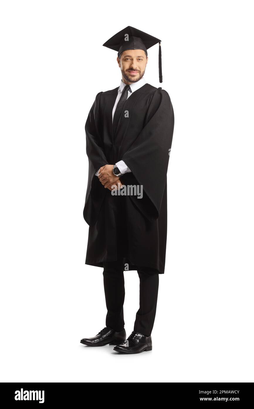 Full length portrait of a man in a graduate gown isolated on white ...