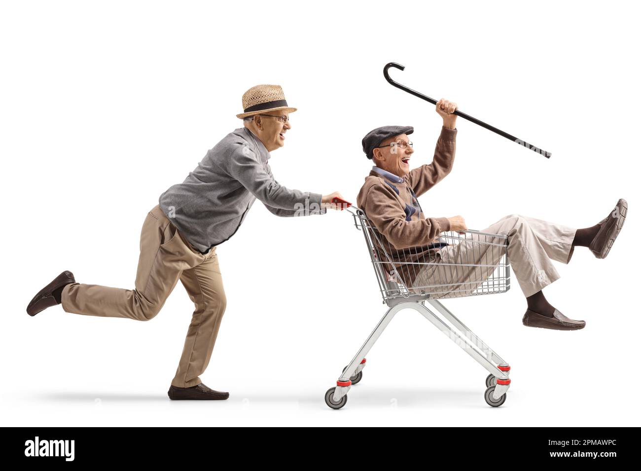 Senior men having fun and riding inside a shopping cart isolated on ...