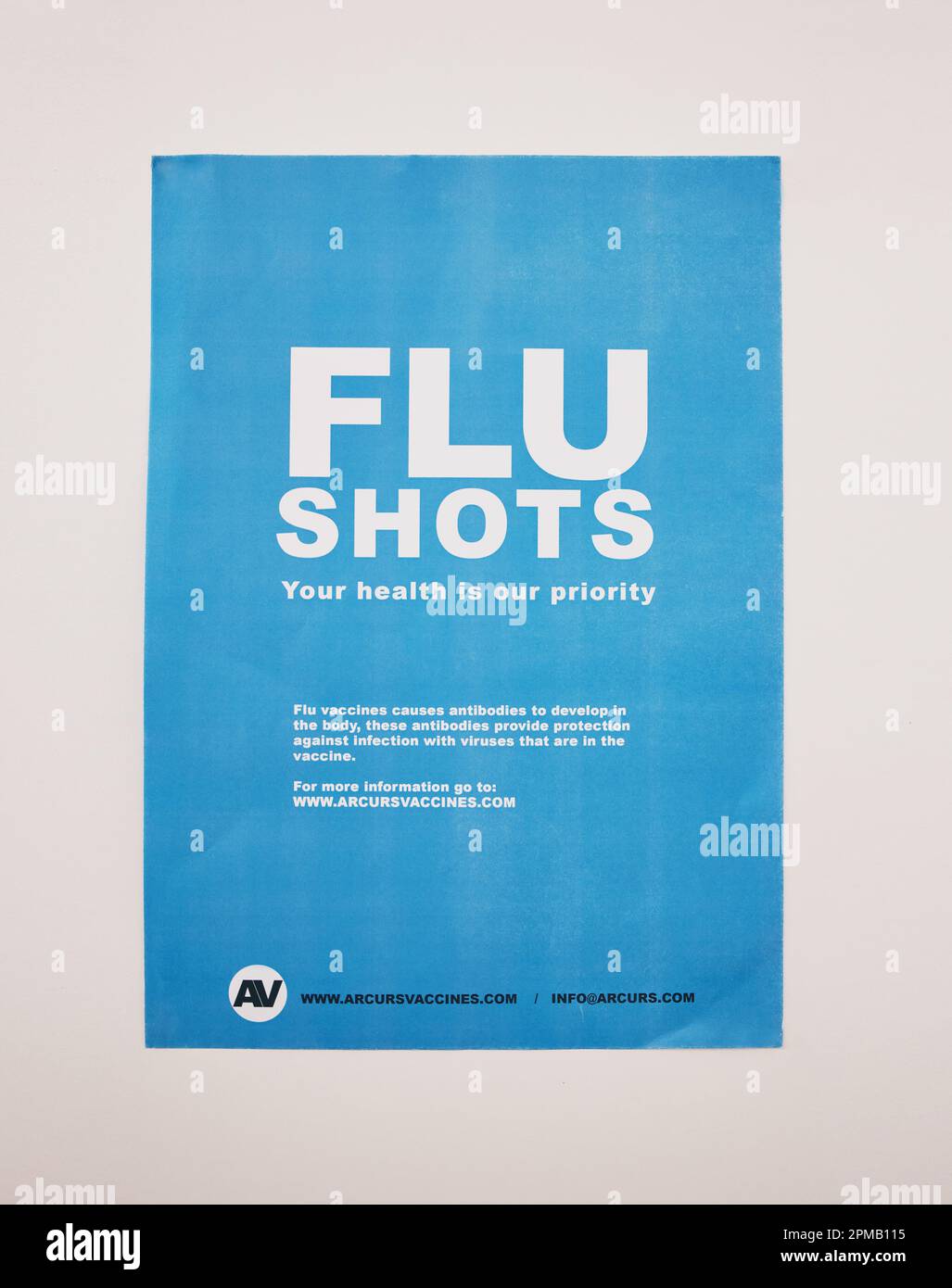 Healthcare background, vaccine and flu shot poster on wall in clinic ...