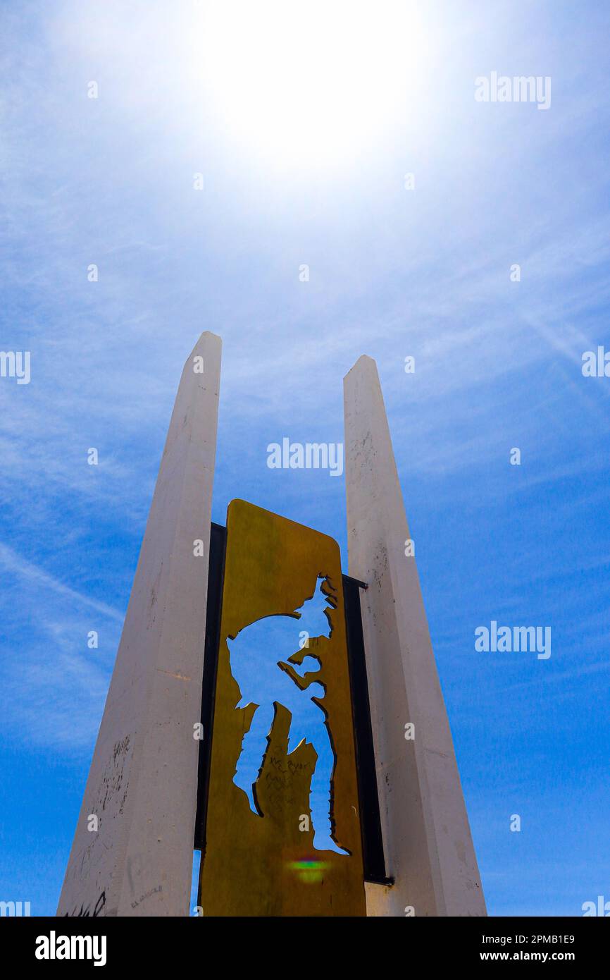 Silhouette on the road in a sign of the dancer or dance of the Yaqui ...