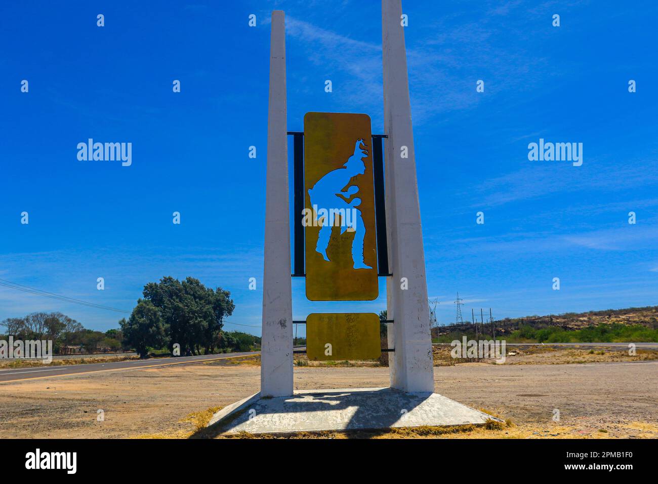 Silhouette on the road in a sign of the dancer or dance of the Yaqui ...
