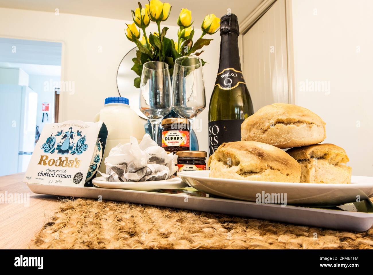 The welcome pack on the dining table in an airbnb property available ...