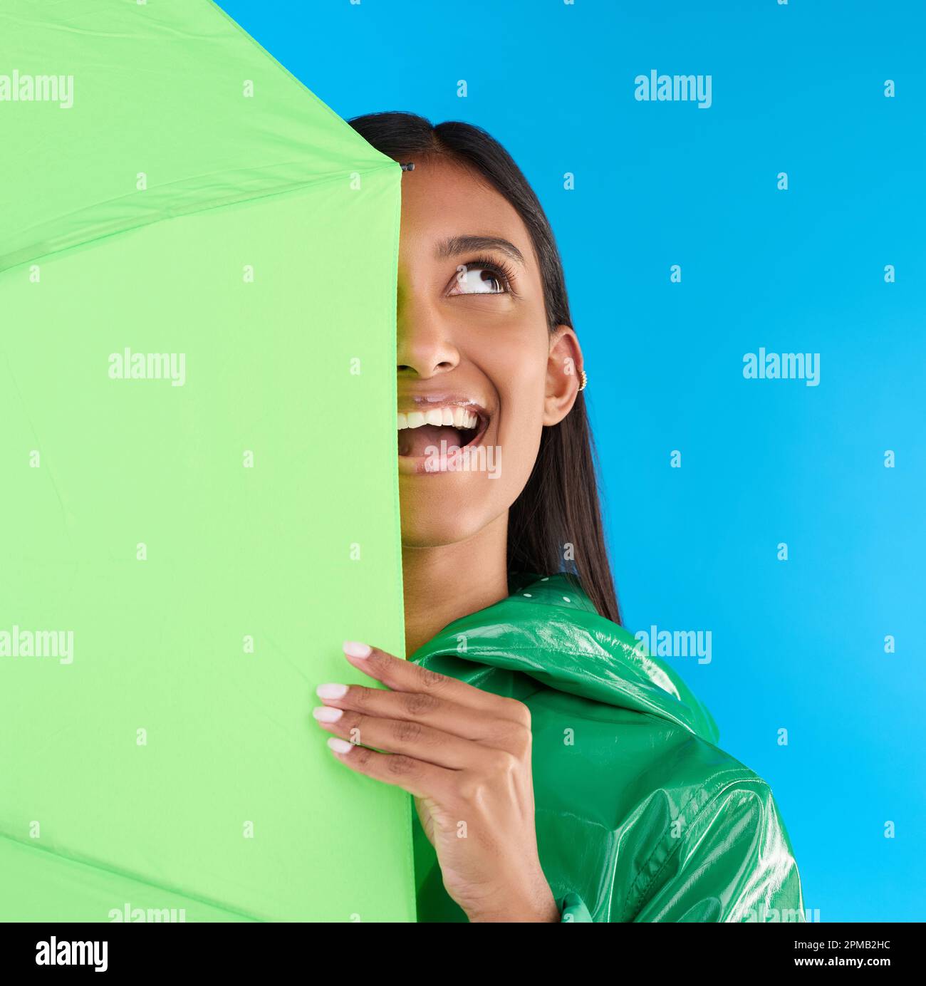 Beautiful woman covering face umbrella hi-res stock photography and ...