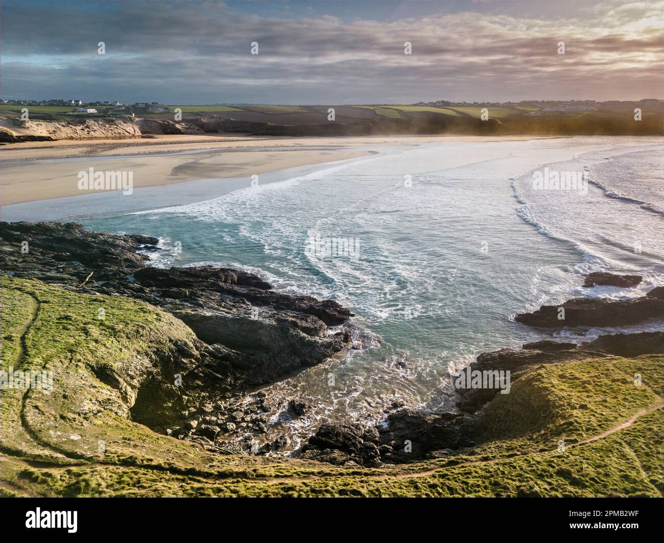 An aerial view of incoming tide at Crantock Beach in Newquay in ...