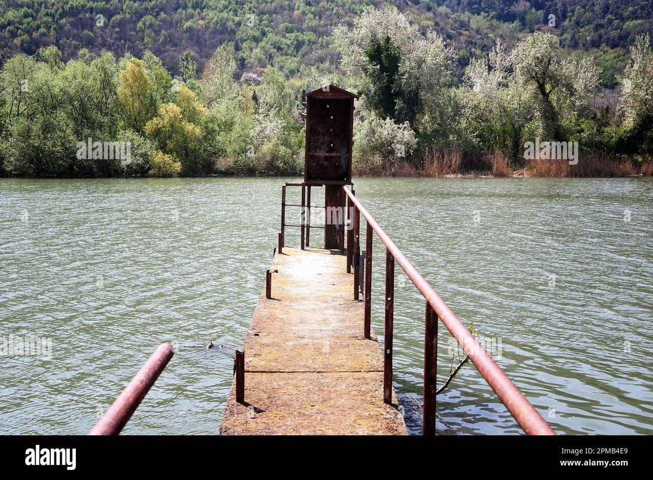 Ancient pontoon for mooring boats now in disuse along the banks of the ...