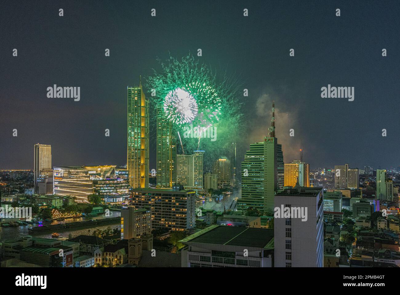 Aerial view of a fireworks display over the Chao Phraya River in ...