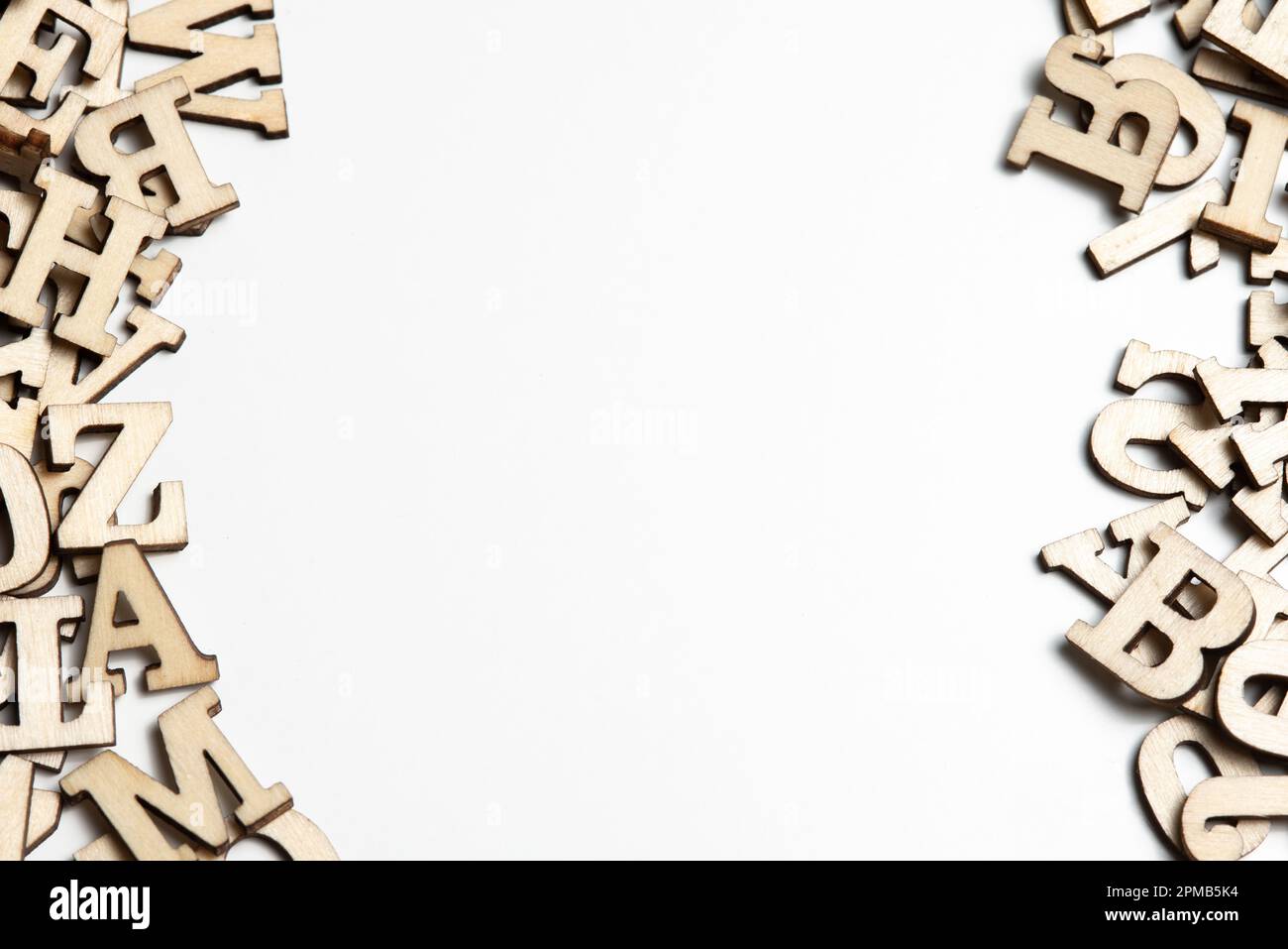 Scattered Random Wood Characters Bordering Image Edge Stock Photo - Alamy