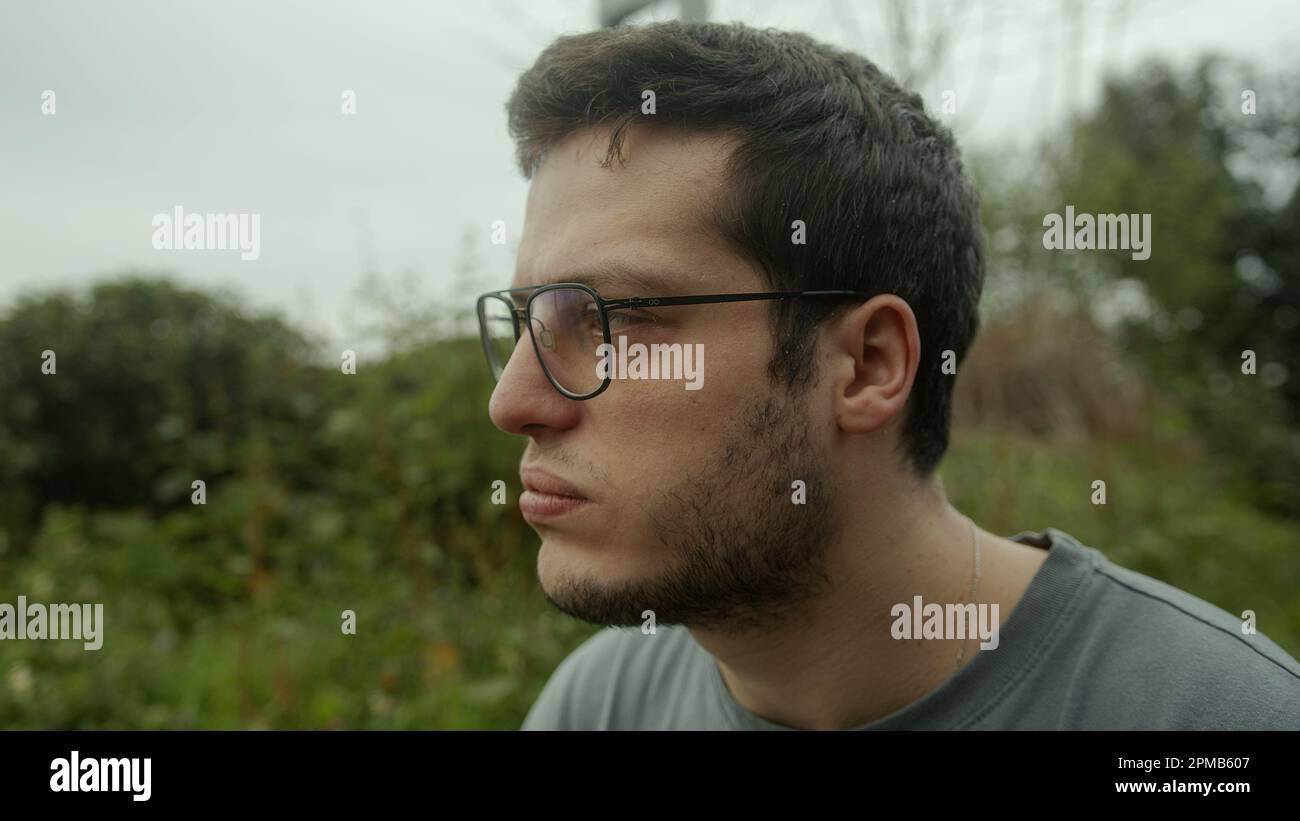Stressed and Distracted Handsome Young Man Outside Sighing and Puffing ...