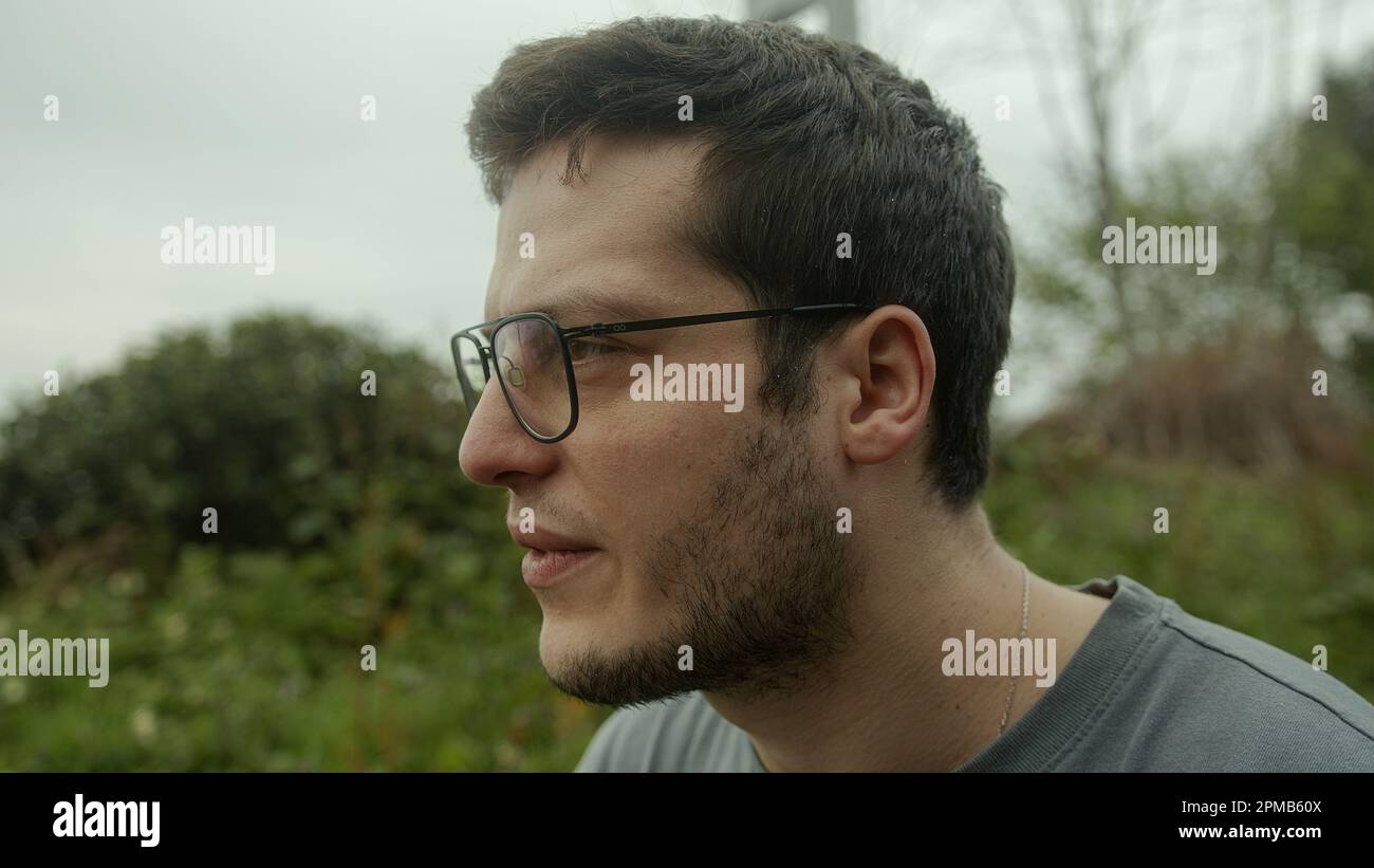 Distracted Handsome Young Man Outside Sighing and Puffing in ...