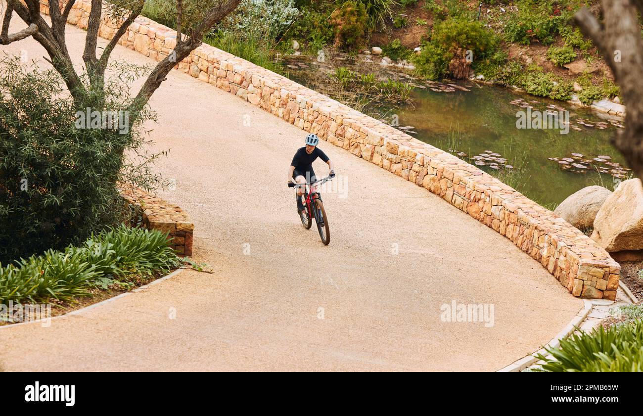 Top view, cycling and woman training, fitness and workout for wellness ...