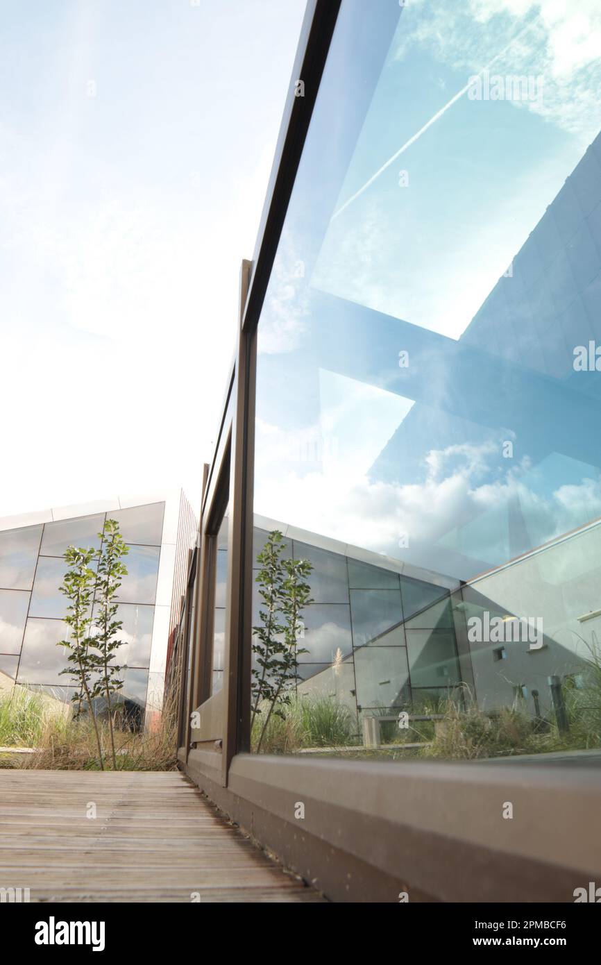 Contemporary designed building in park, standing proudly in green ...