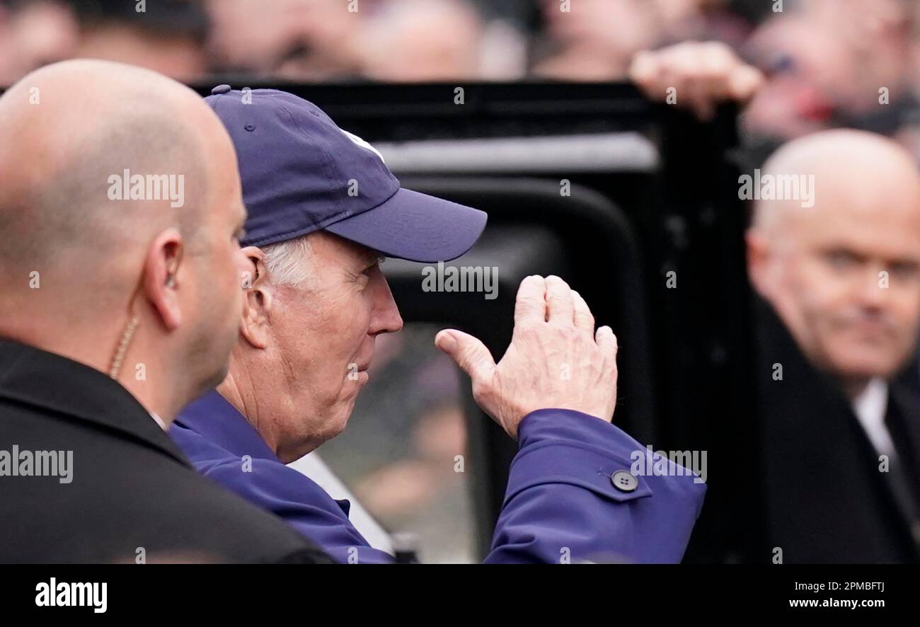 US President Joe Biden salutes the crowd as he leaves after a visit to ...