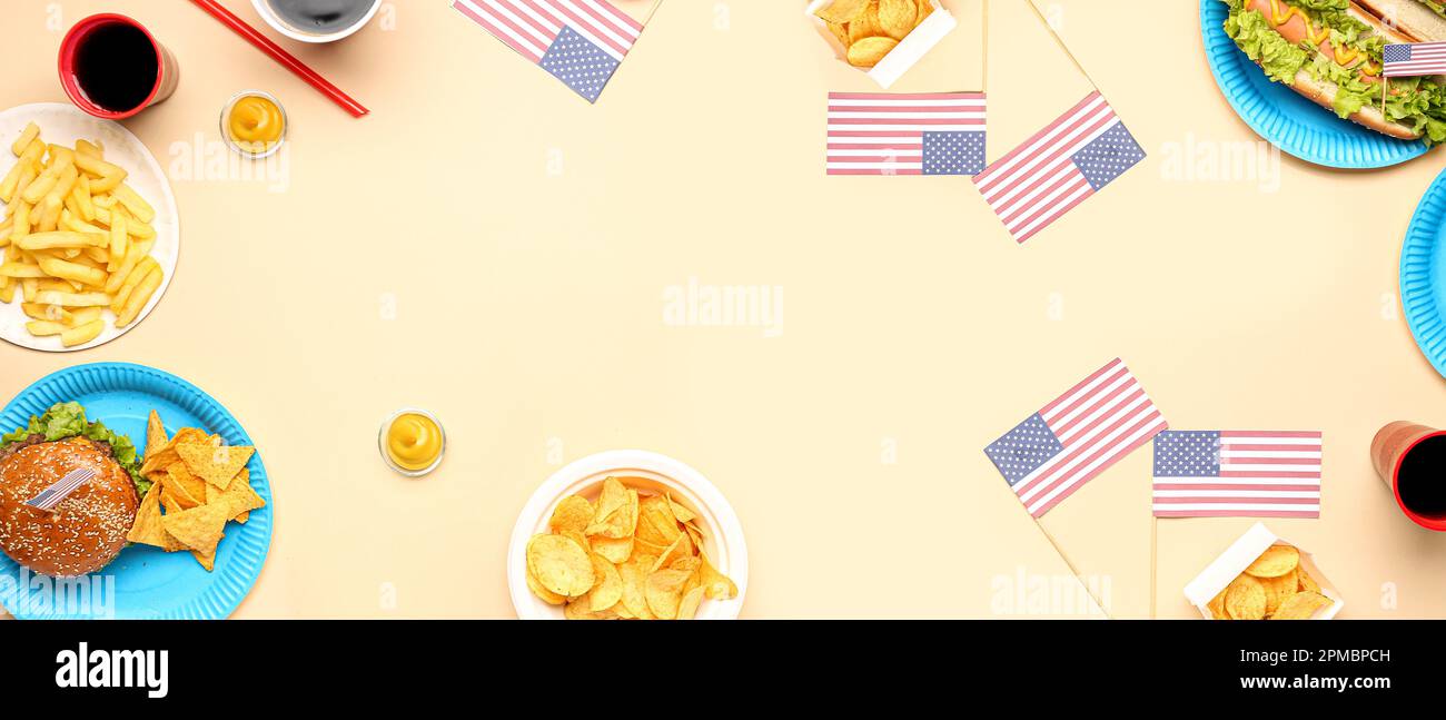 Frame made of American fast food and paper flags on light background ...