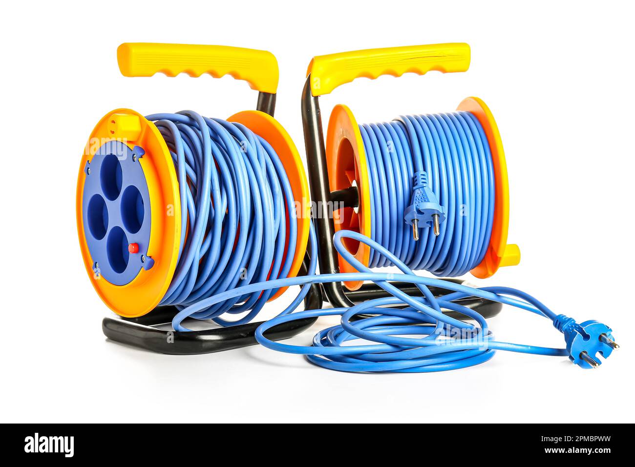 Extension electric cable reels on white background Stock Photo - Alamy