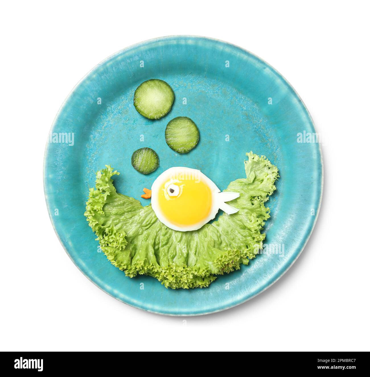 Plate with funny children's breakfast in shape of fish isolated on ...