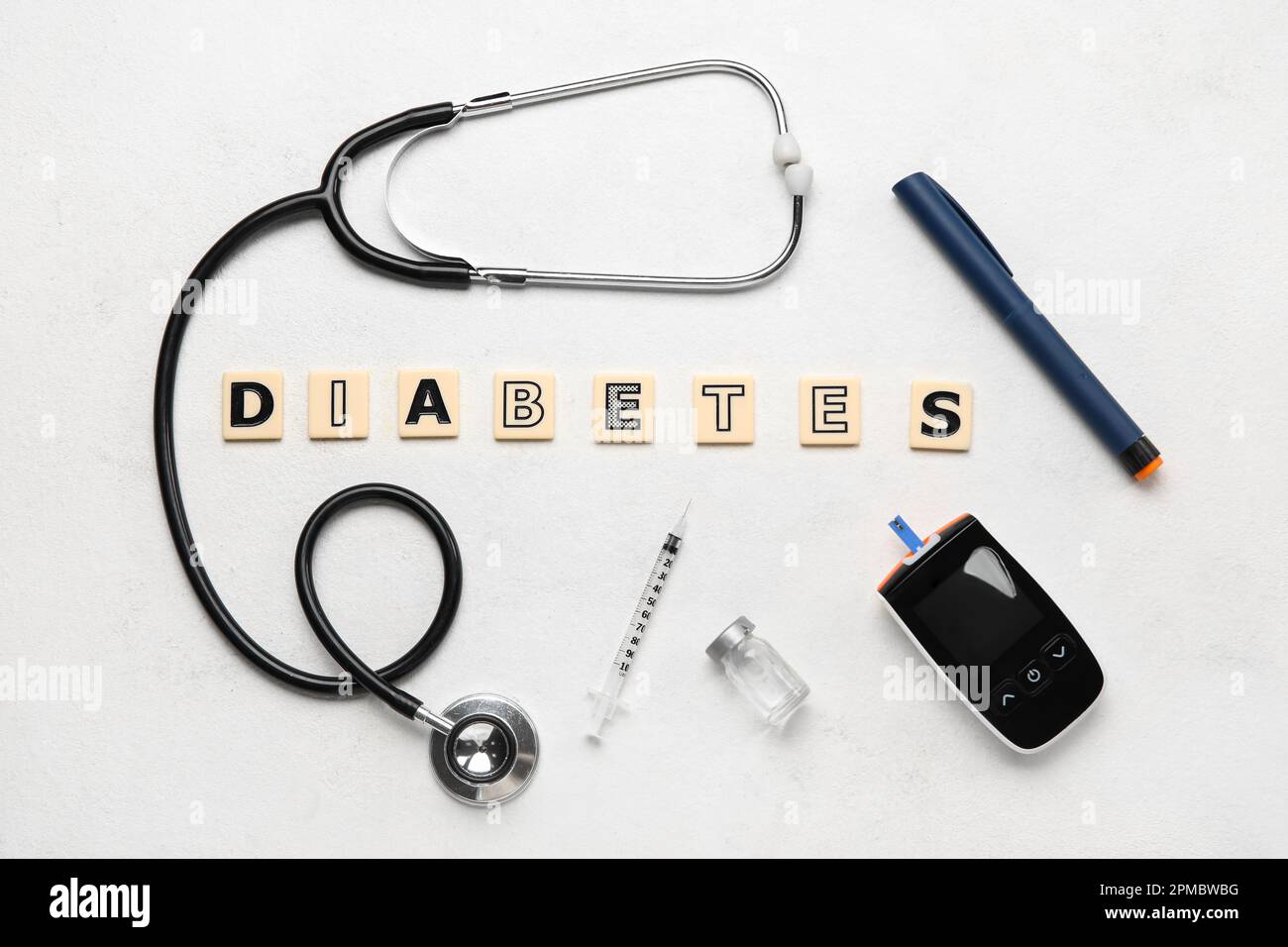 Word DIABETES with insulin, glucometer, lancet pen and stethoscope on ...