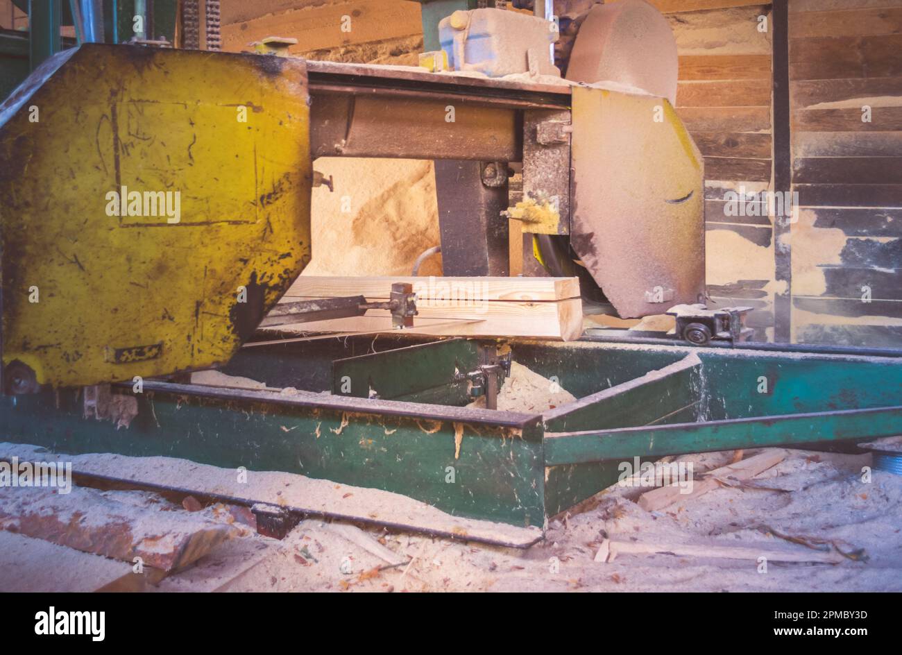 Sawmill. Process of machining logs in equipment sawmill machine saw ...