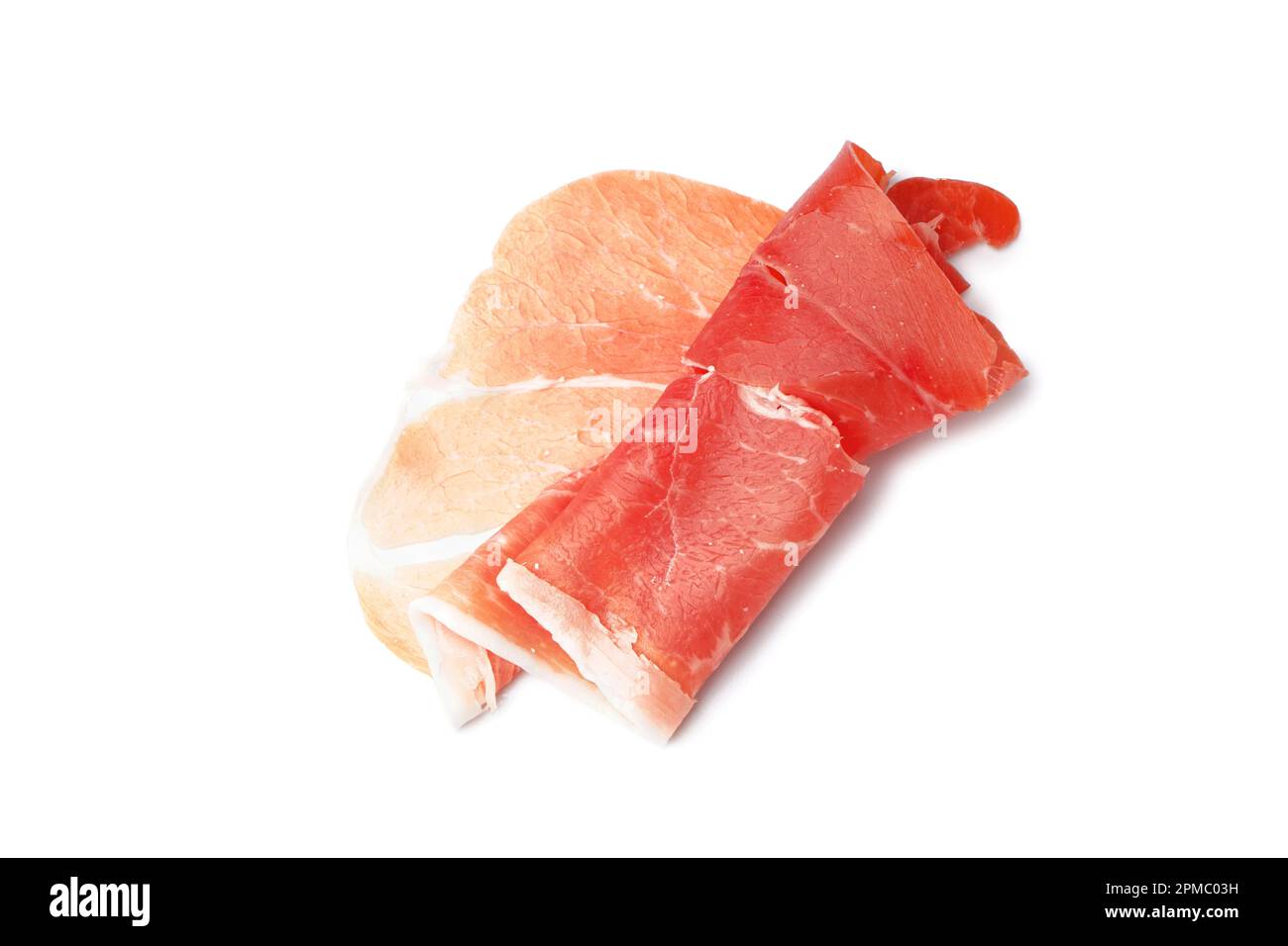 Tasty jamon slice on white background Stock Photo - Alamy