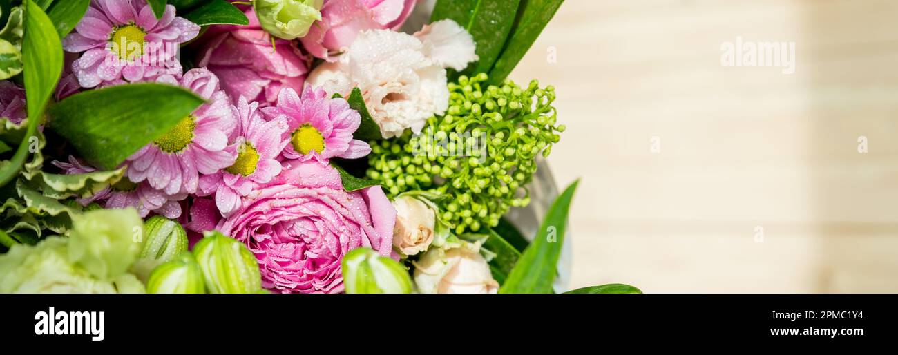 two bouquets of roses, daisies, lisianthus, chrysanthemums, unopened ...