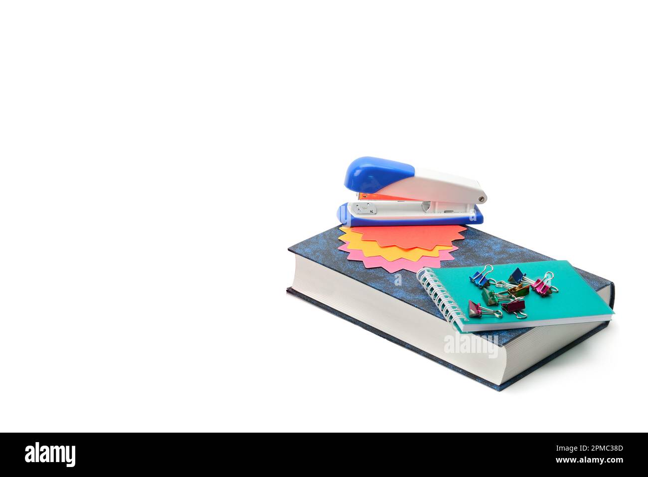 Book and stationery set isolated on a white background. Free space for ...