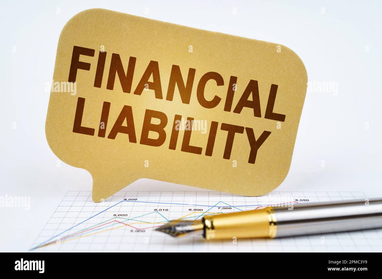 Business concept. On the business diagram is a pen and a sign with the ...