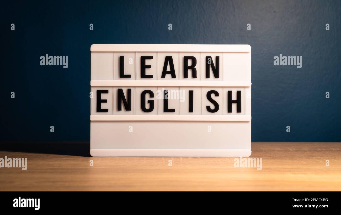 Learning English concept. Learn English message on white letter board ...