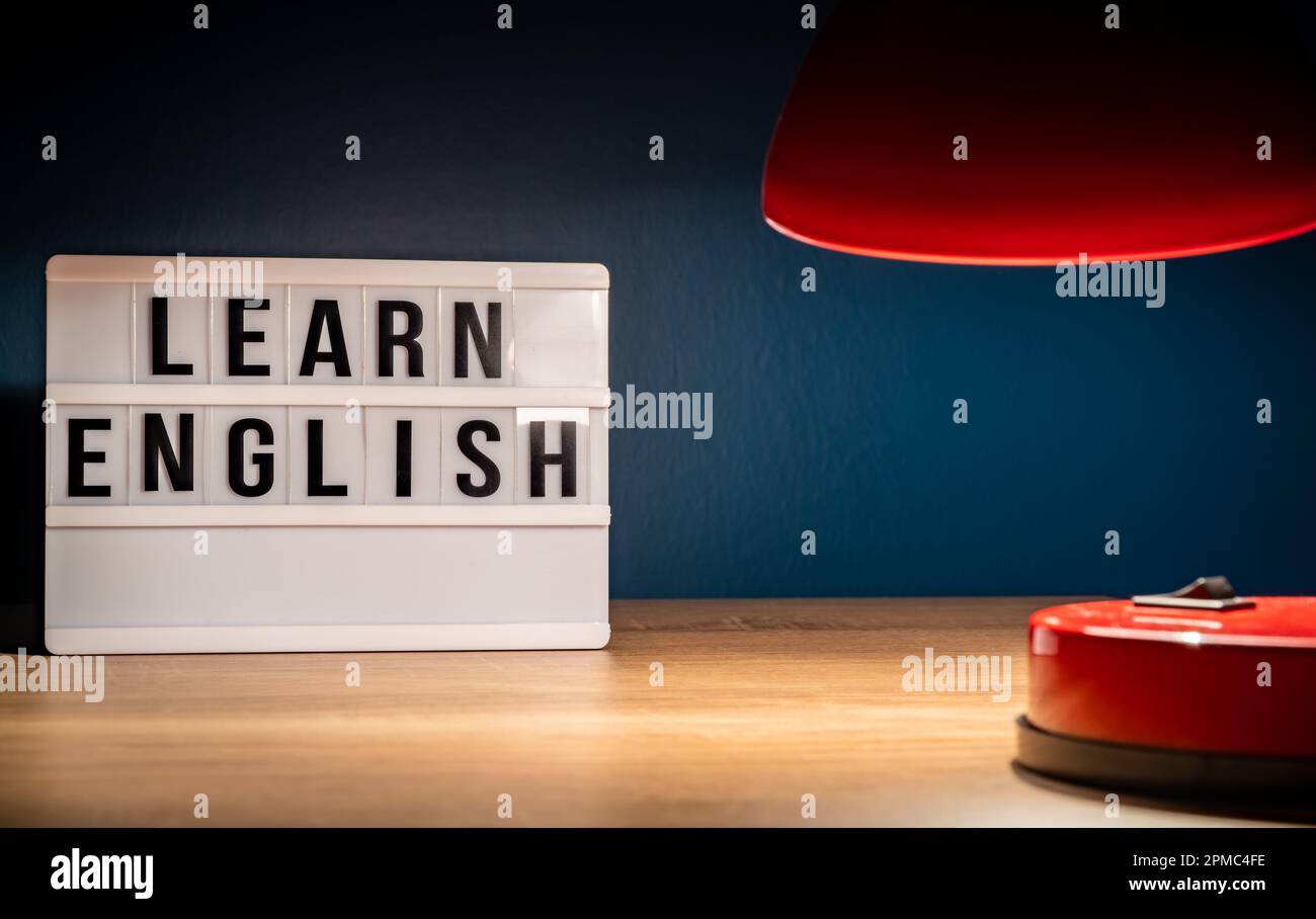 Learning English concept. Learn English message on white letter board ...