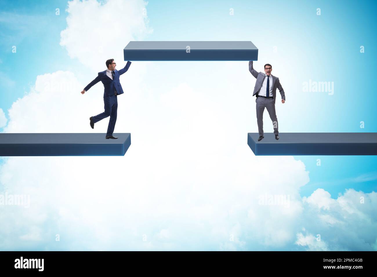 Concept of teamwork with the bridge being built Stock Photo - Alamy