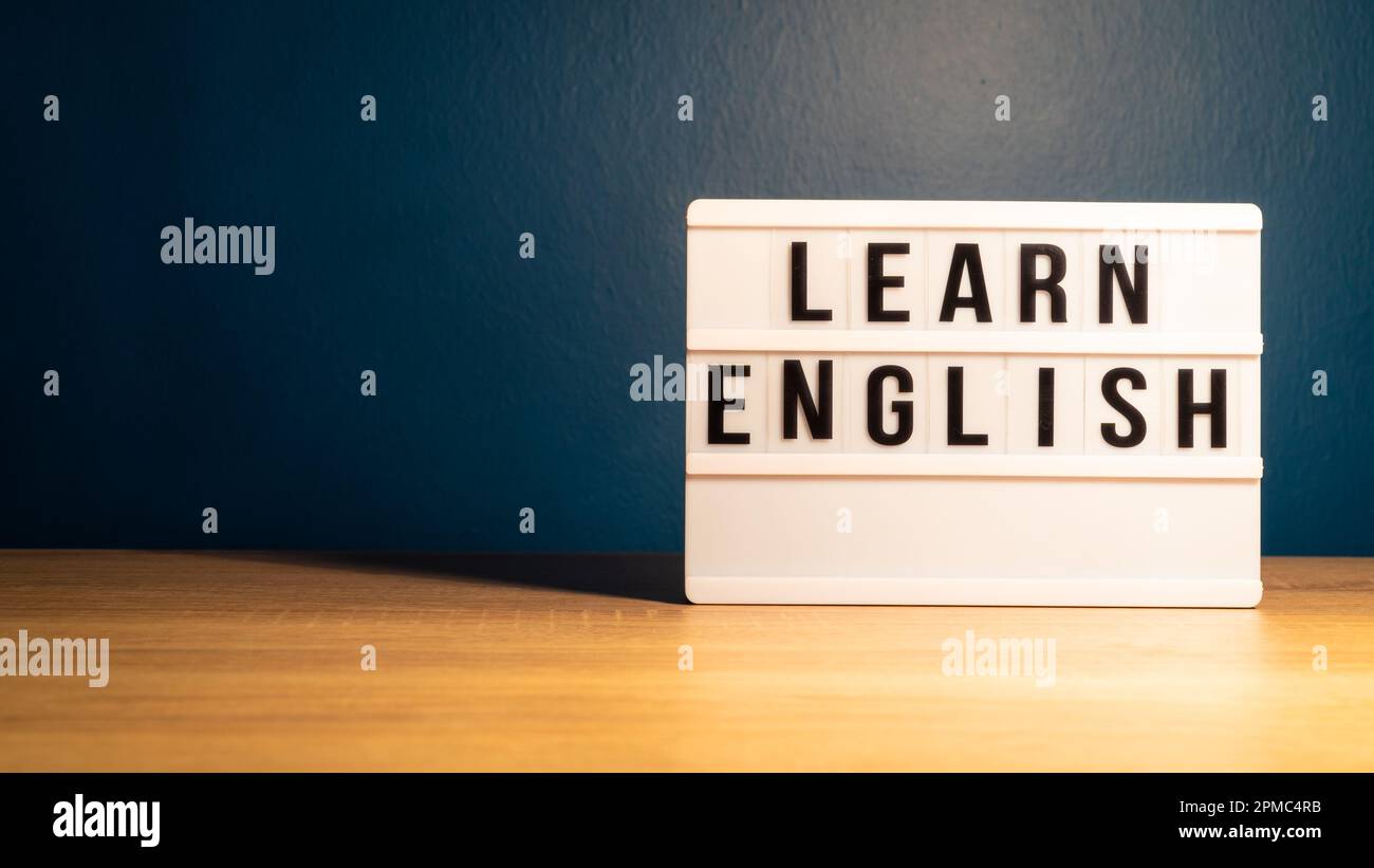 Learning English concept. Learn English message on white letter board ...